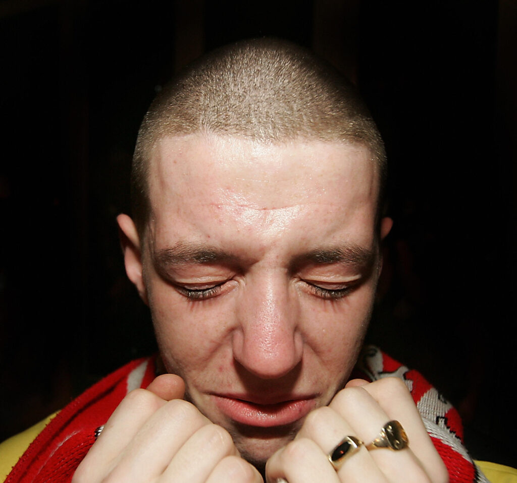 A Liverpool fan weeps for joy outside a - UnHerd